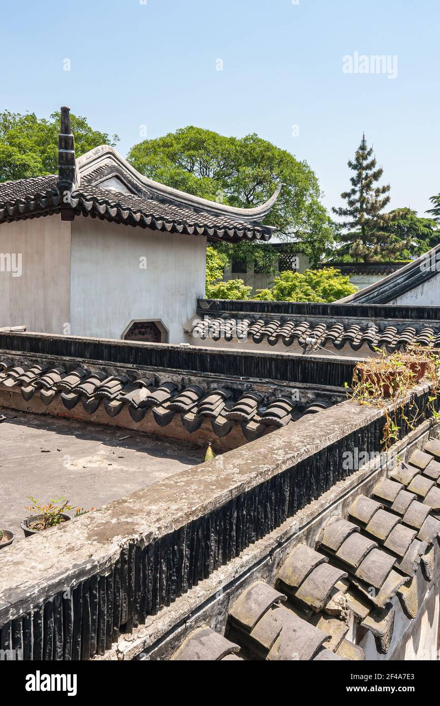 Suzhou, China - May 3, 2010: Black roofs in wall protections in Chinese ...