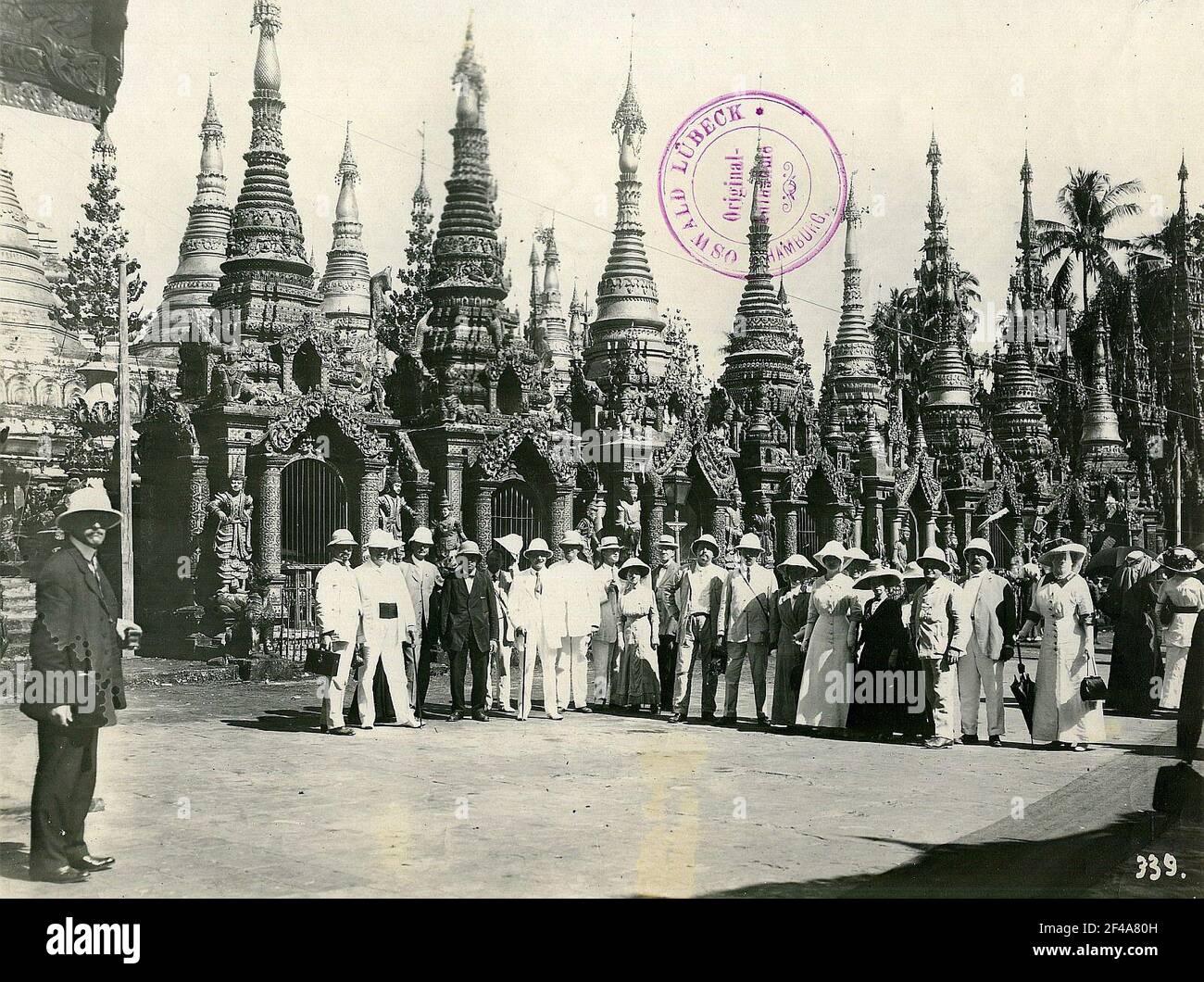 Rangonn, Burma. Tourist group of Hapag posing in front of fabric ...