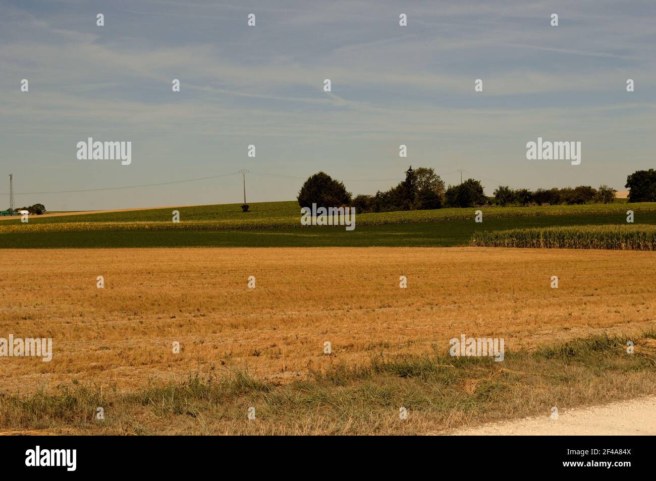 Open fields, farm tractors and agriculture in northern france, piney ...