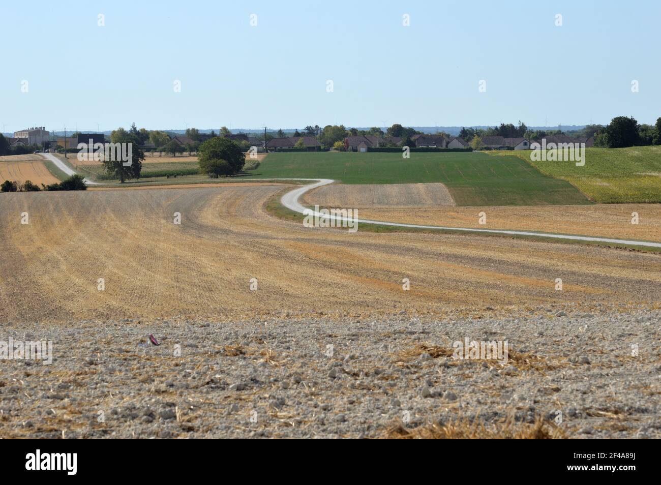 Open fields, farm tractors and agriculture in northern france, piney ...