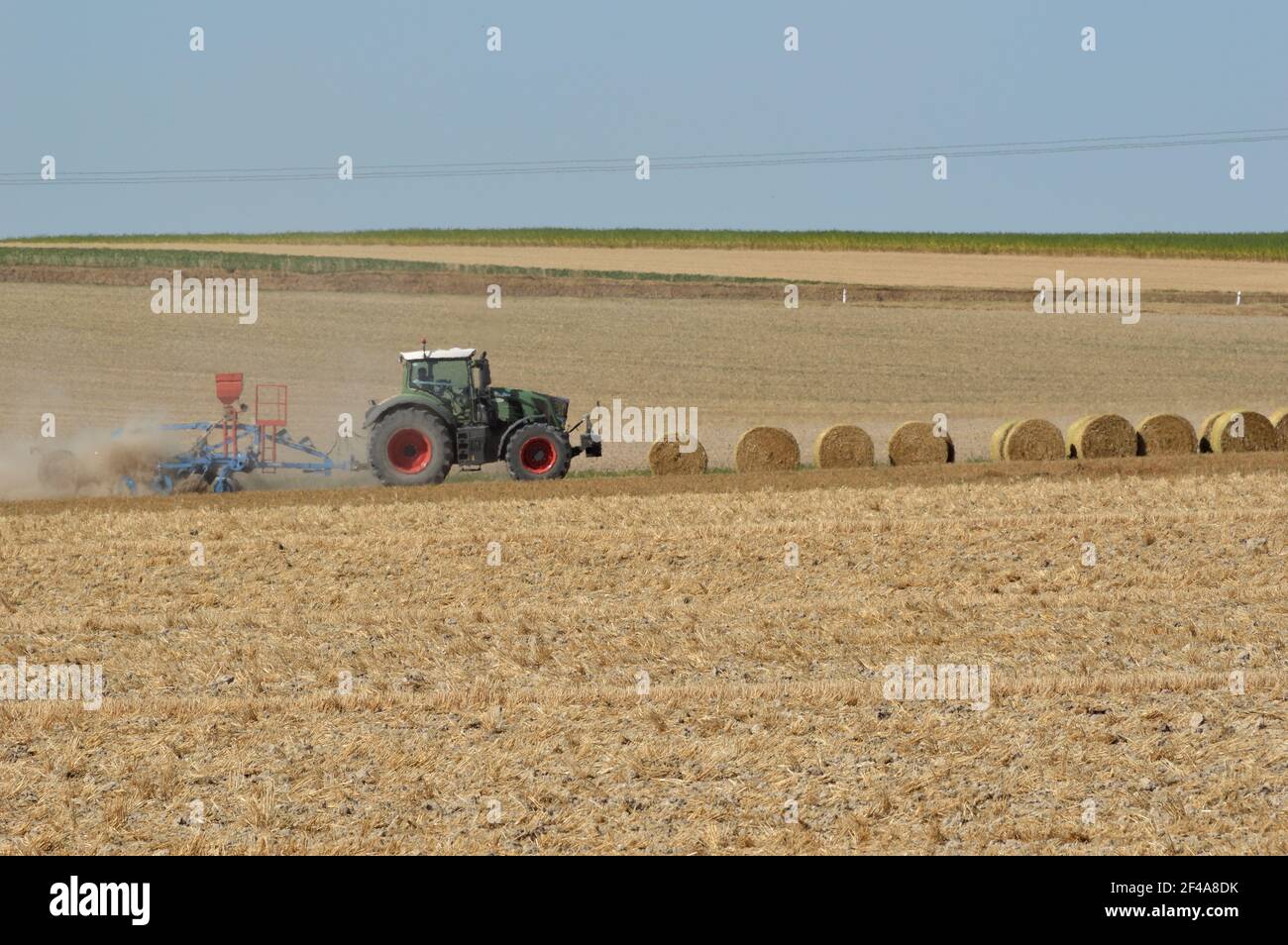 Open fields, farm tractors and agriculture in northern france, piney ...