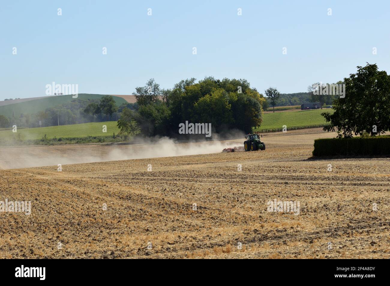 Open fields, farm tractors and agriculture in northern france, piney ...