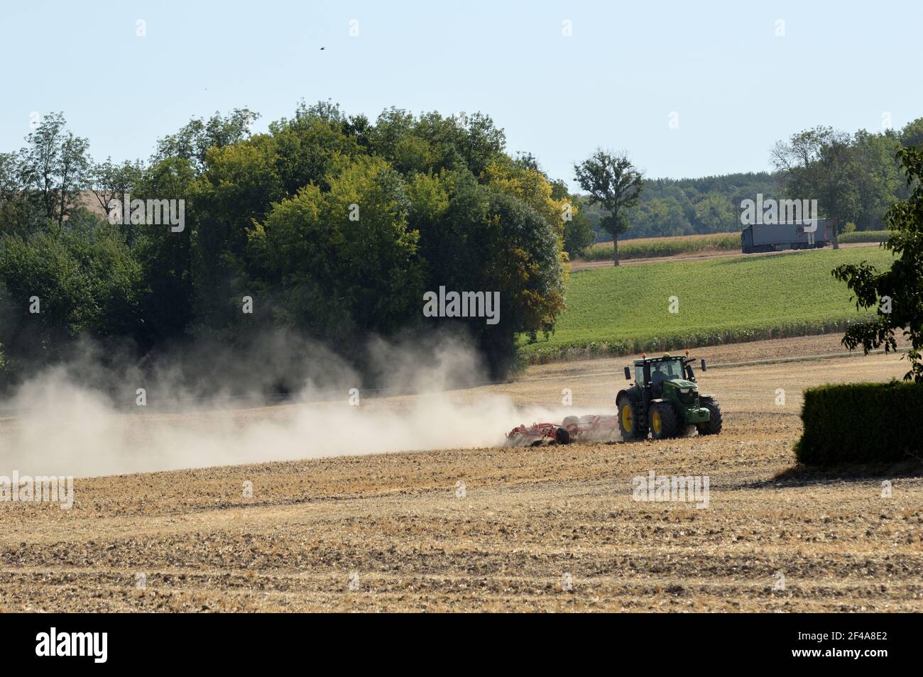 Open fields, farm tractors and agriculture in northern france, piney ...