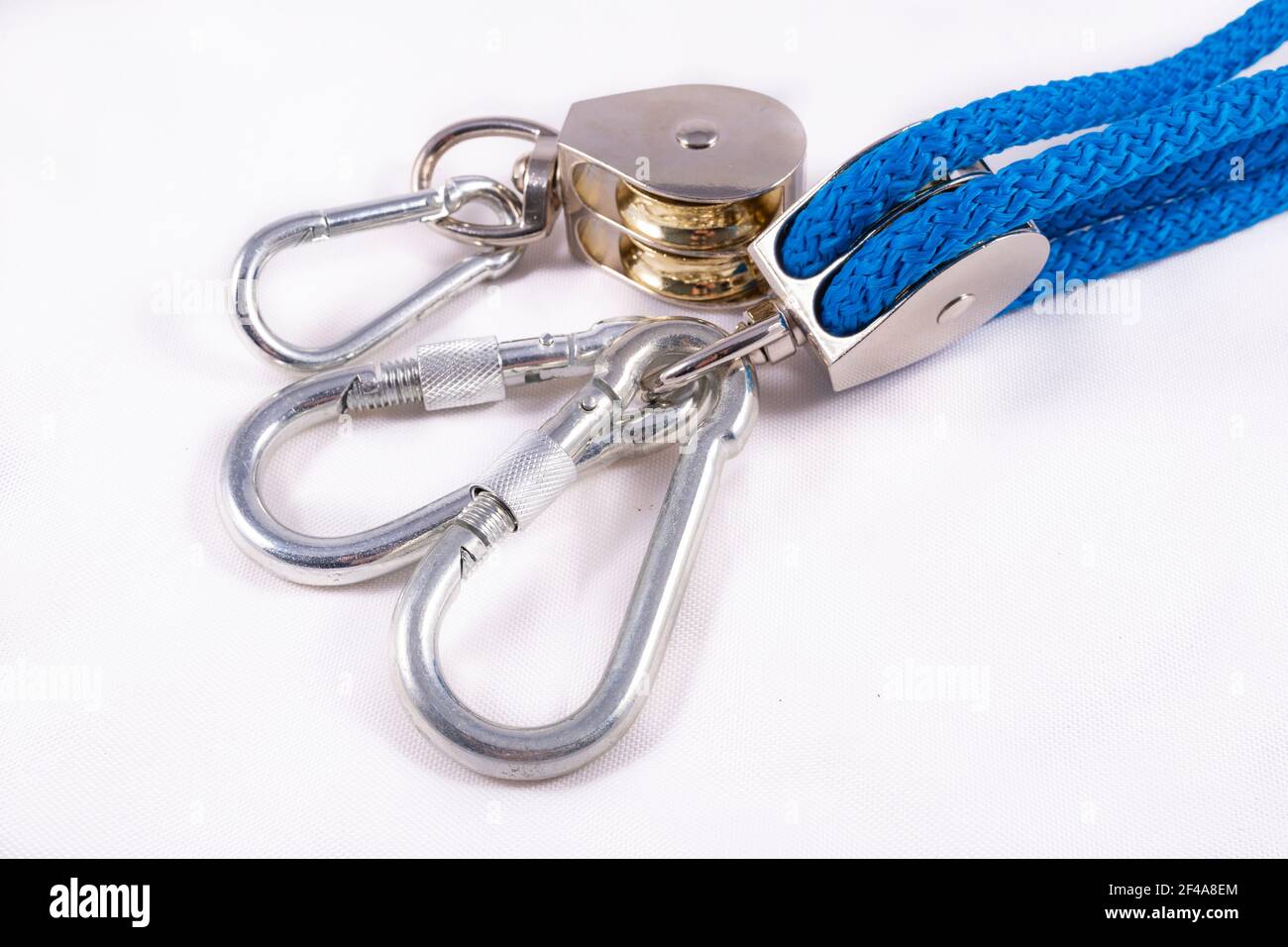 Rope, carabiner and sailing pulley. Accessories used on a deep sea ...