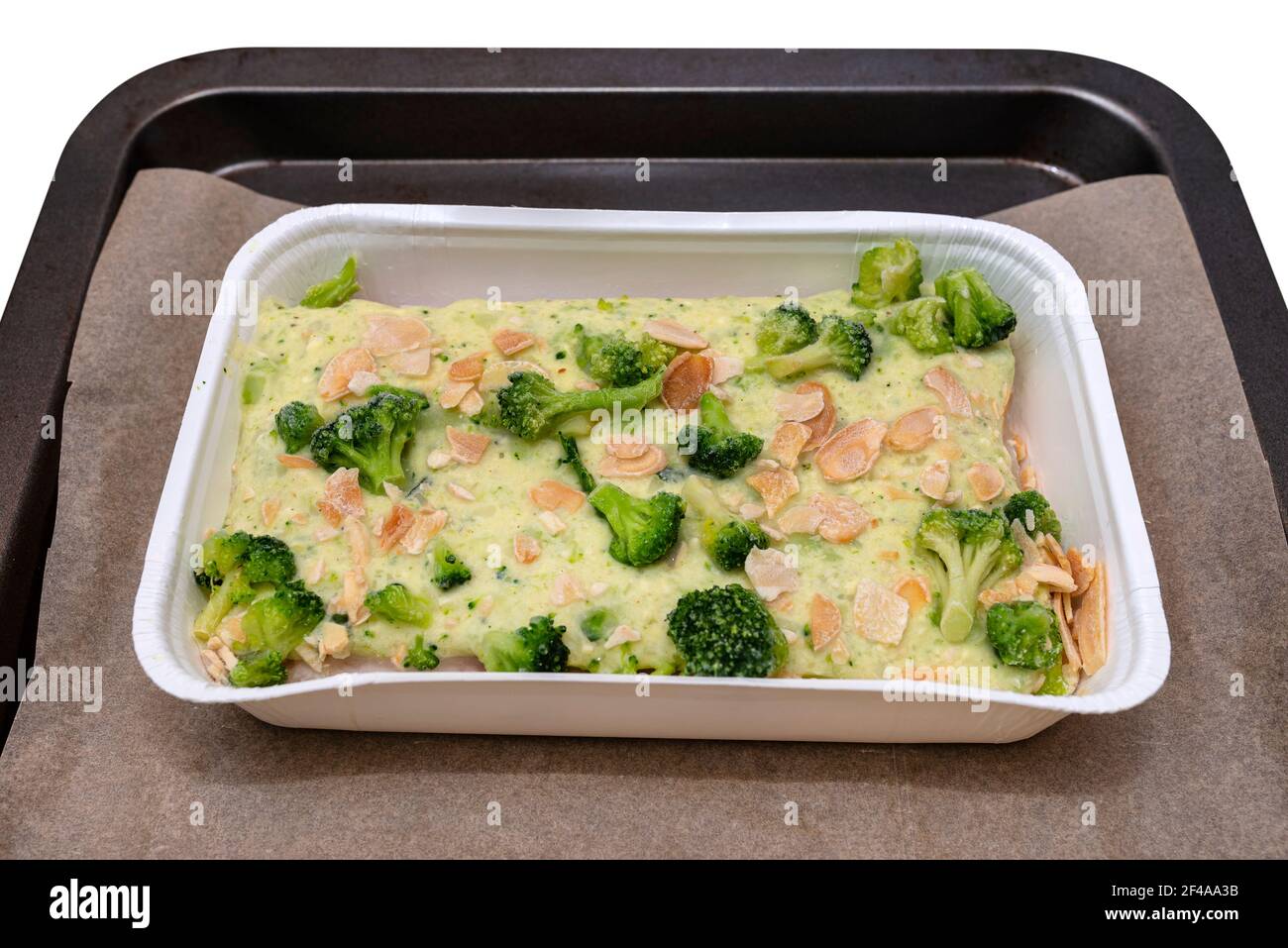 Frozen pollock fillet with broccoli and roasted almonds in a cream ...