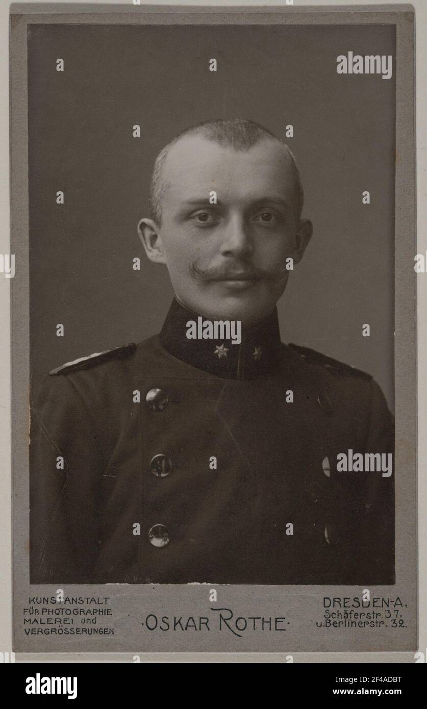 Portrait of a young man in uniform, taken in the artist for photography ...