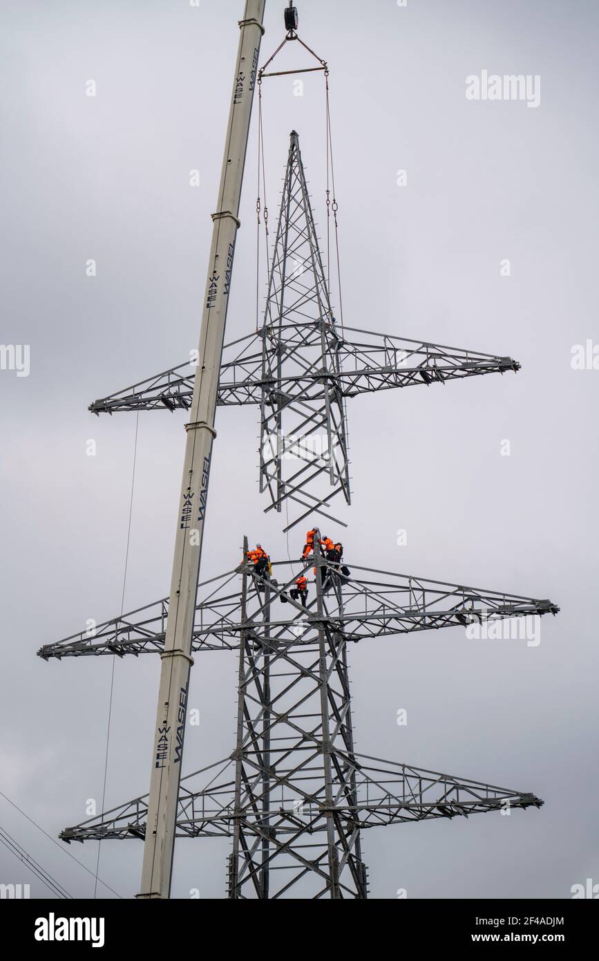 Installation of a high-voltage pylon, construction of a new ...