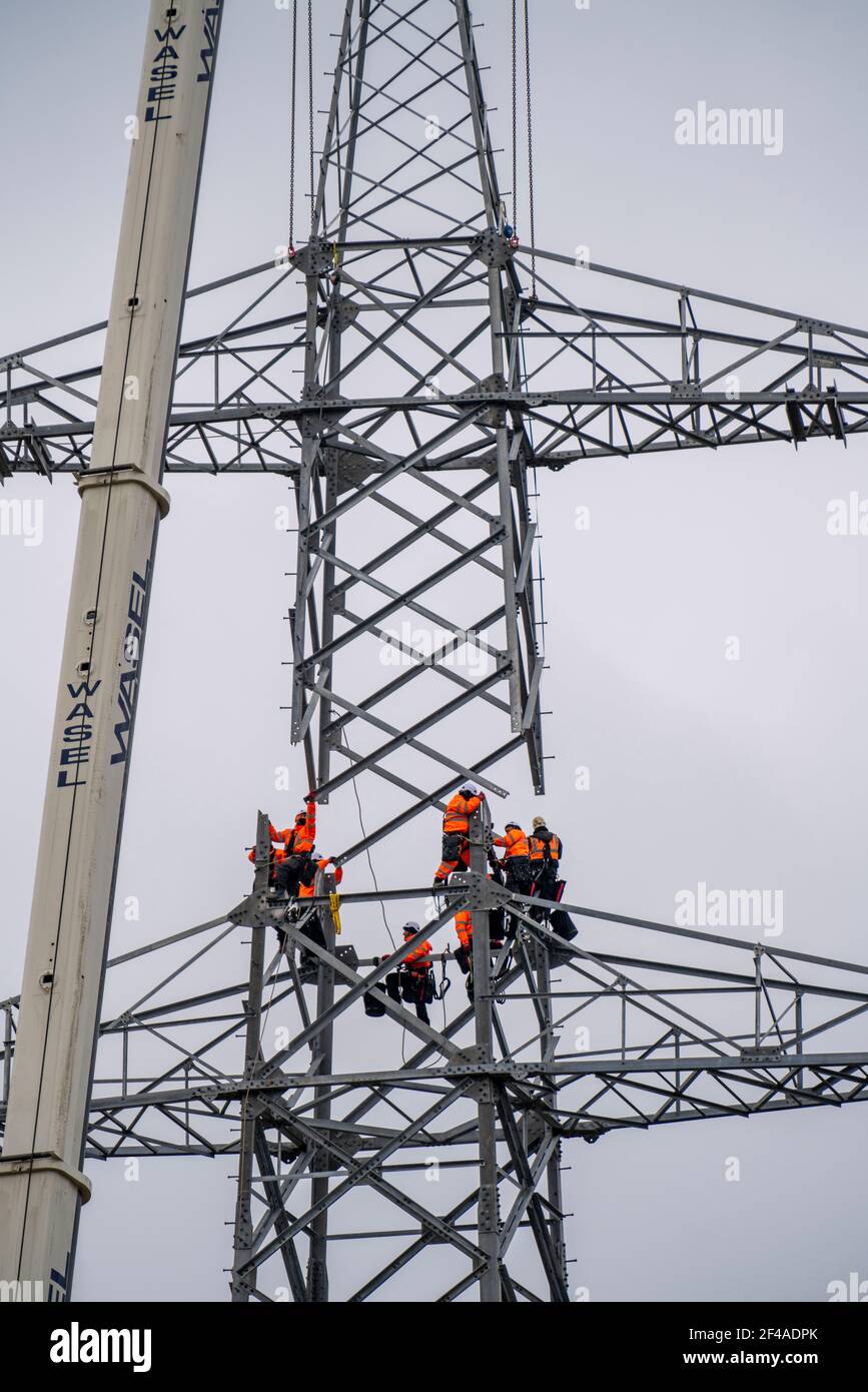 Installation of a high-voltage pylon, construction of a new ...