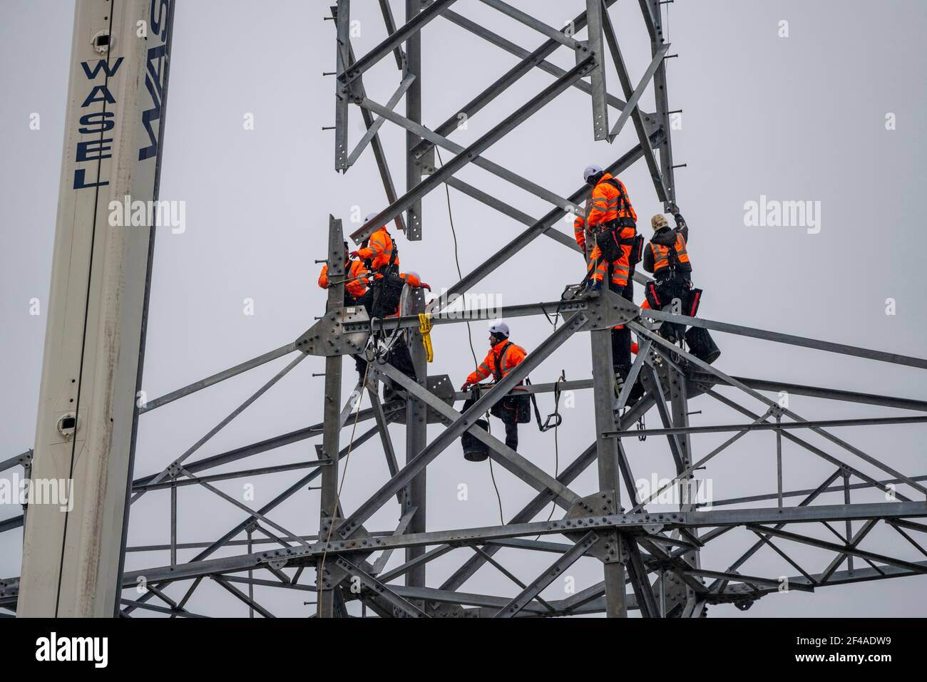 Installation of a high-voltage pylon, construction of a new ...