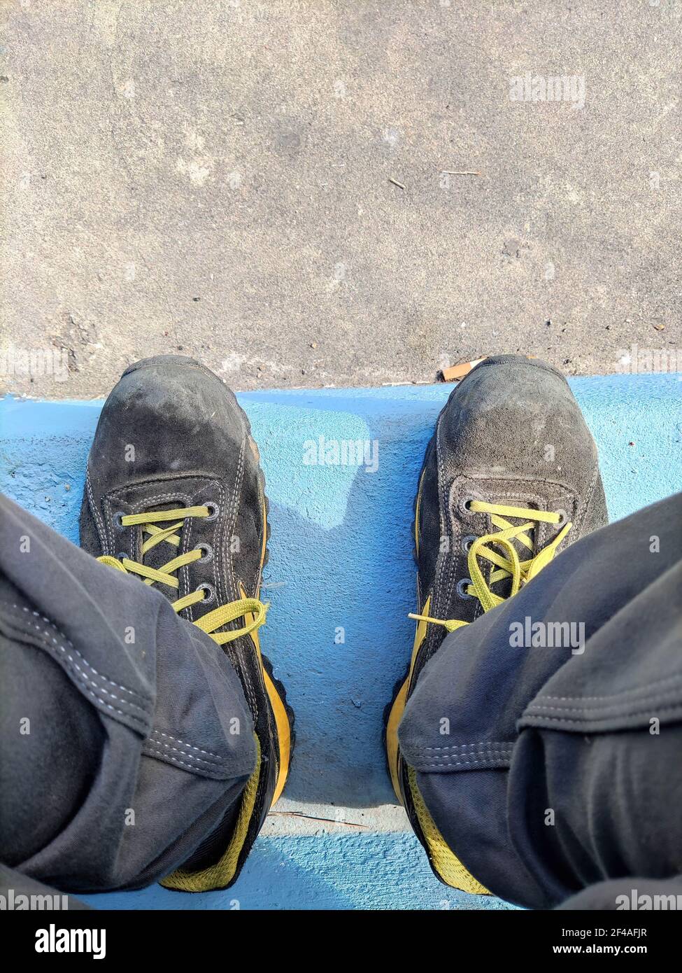 Break time sitting on the stairs after work Stock Photo - Alamy