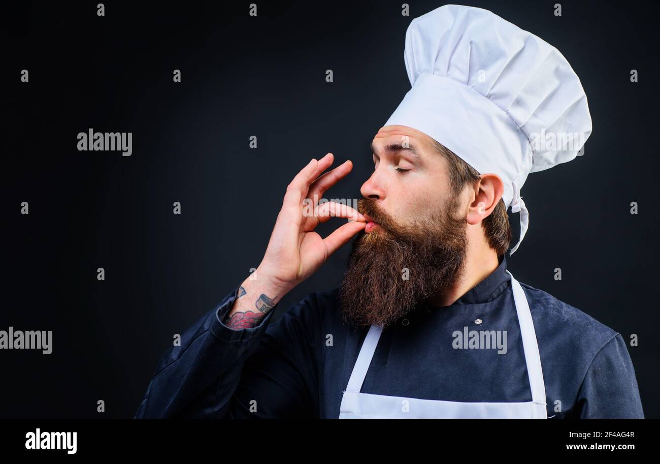 Chef, cook, baker gesturing excellent. Professional chef in uniform ...