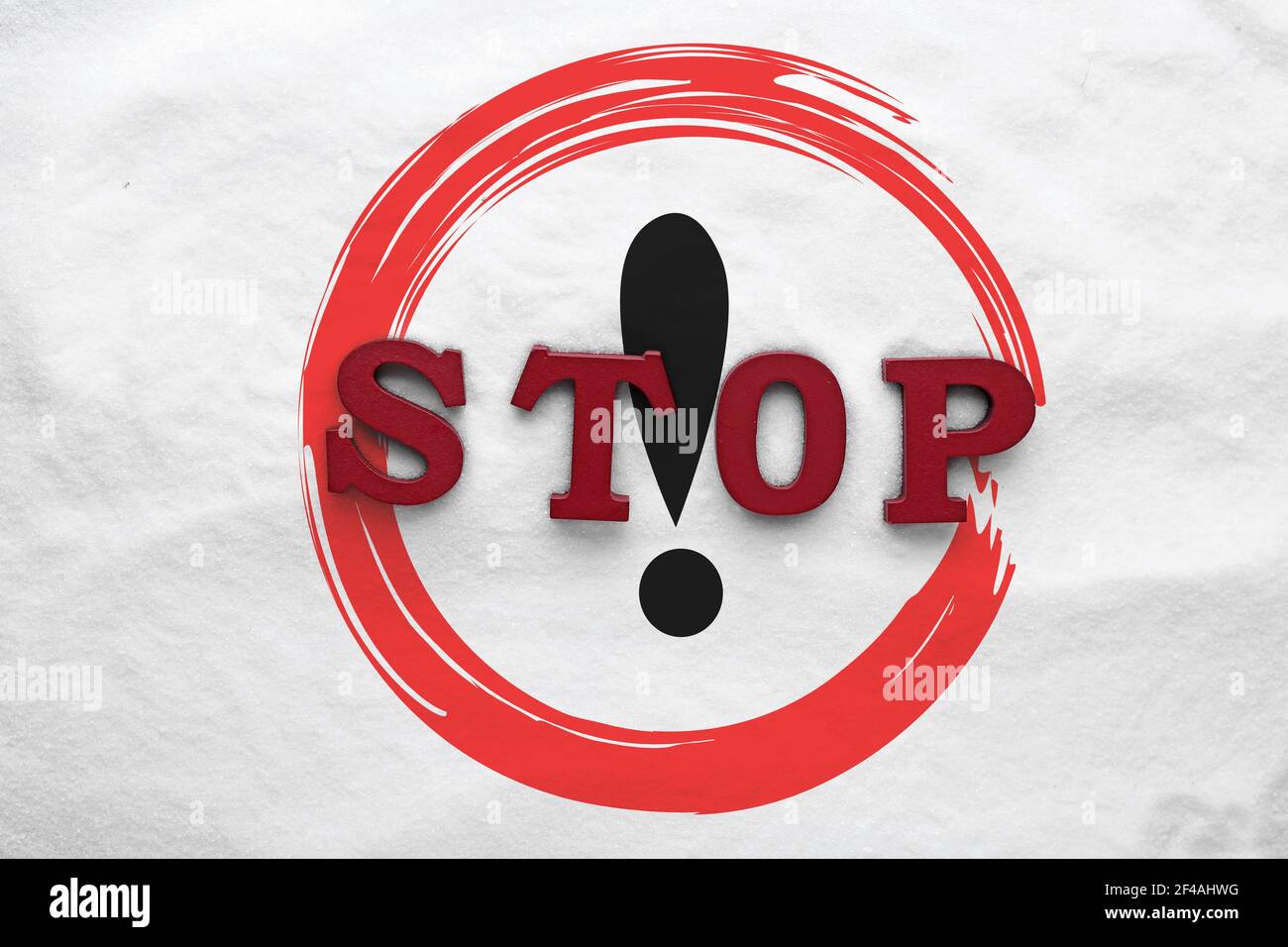 Warning sign with word STOP on salt Stock Photo - Alamy