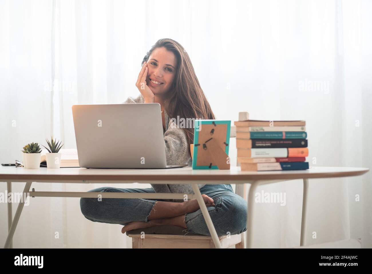 young woman teleworking at home with computer Stock Photo - Alamy