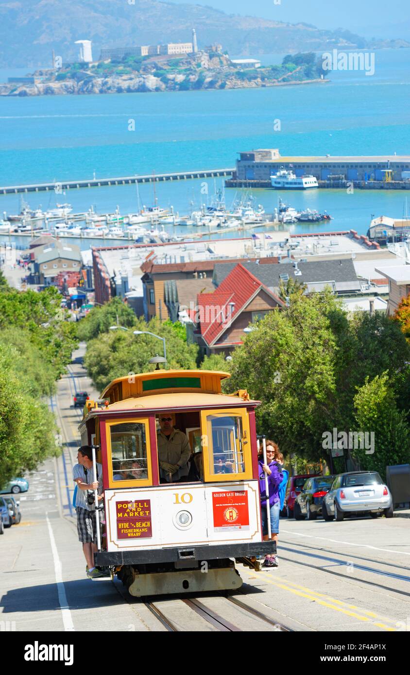 Powell-Hyde line cable car with Alcatraz Island in the background, San ...