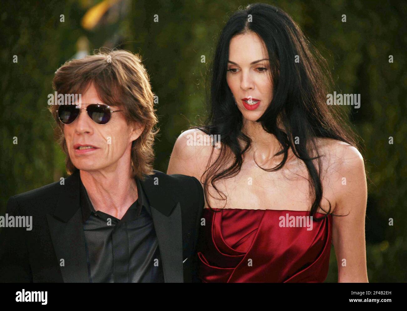 Mick Jagger and L'Wren Scott attend the Vanity Fair Oscar Party at ...