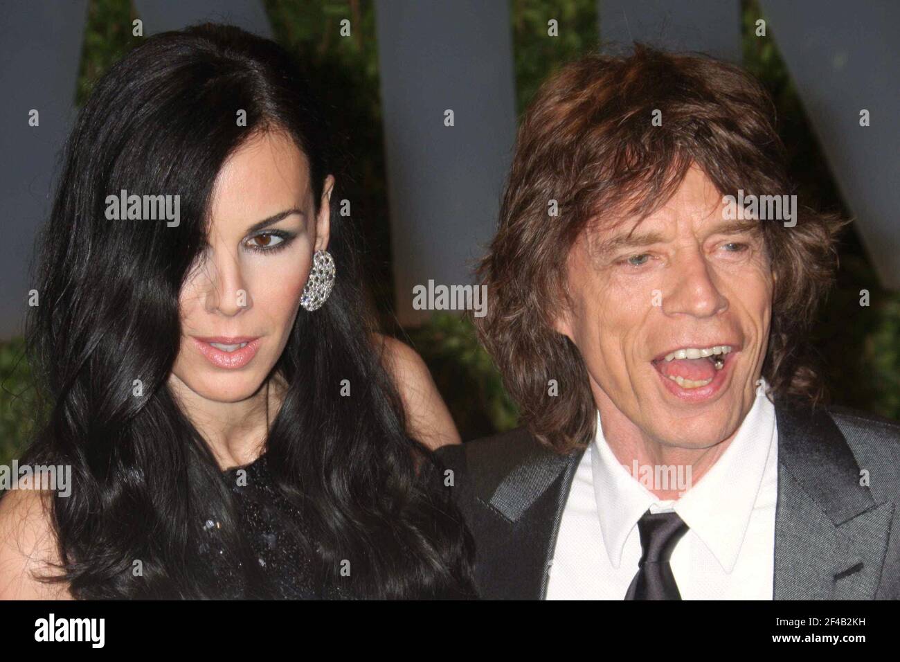 L'Wren Scott and Mick Jagger attend the Vanity Fair Oscar Party at ...