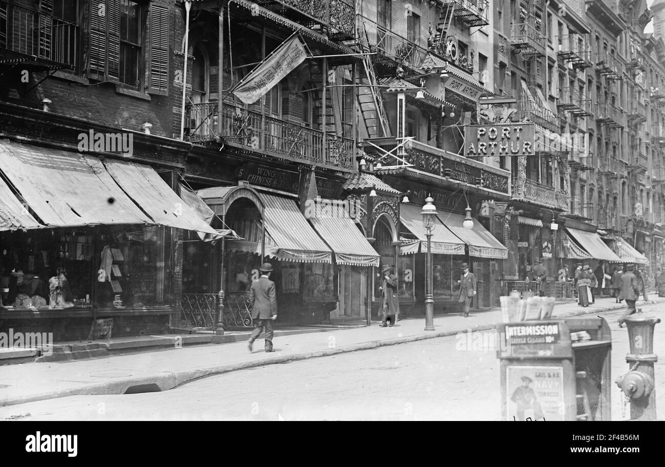 Mott Street in Chinatown, New York City. Church of the Transfiguration ...