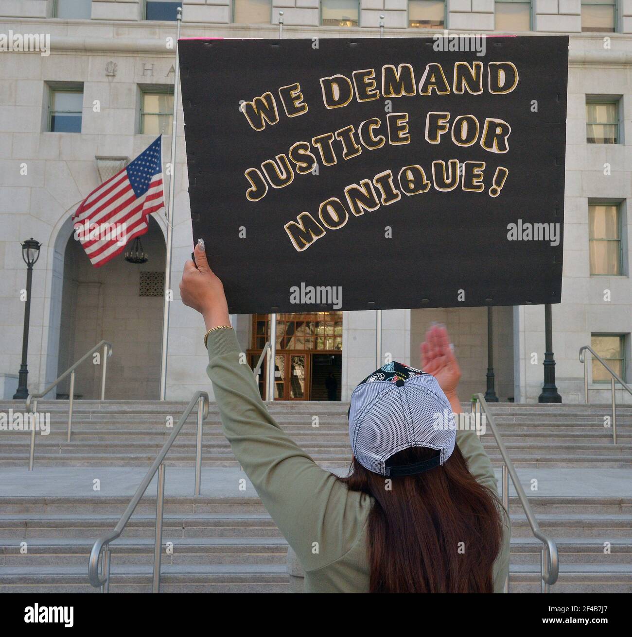 Los Angeles, USA. 19th Mar 2021. Grieving family and community members ...