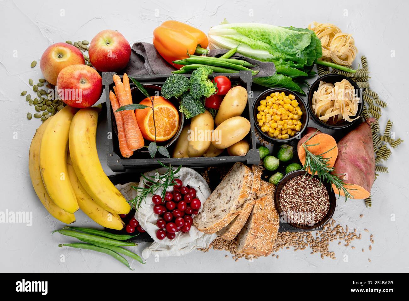 Best sources of carbs on light gray background. Healthy food concept ...