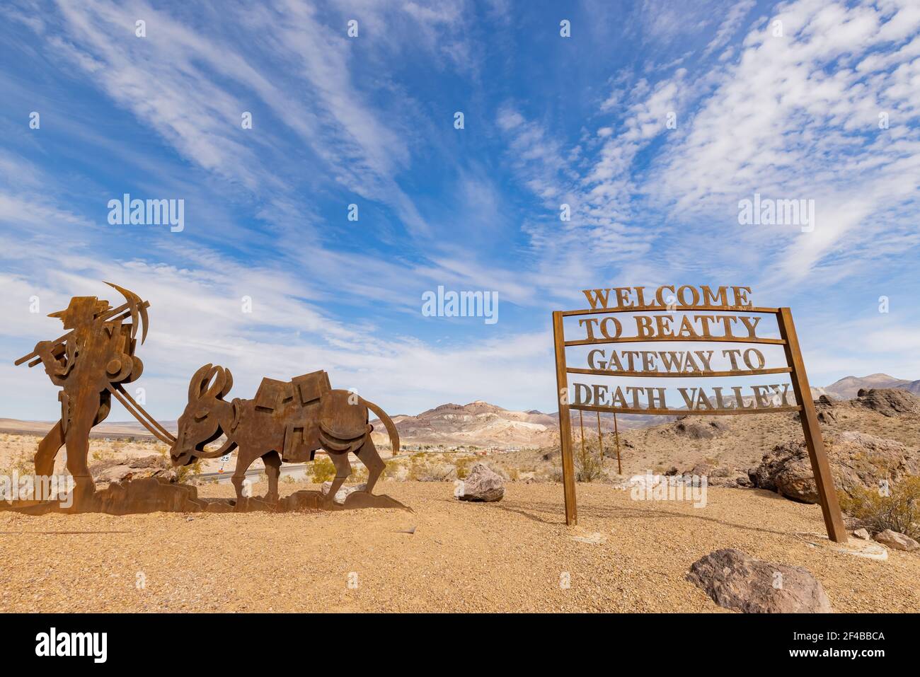 Metal sculpture sign before entering Beatty town at Nevada Stock Photo ...