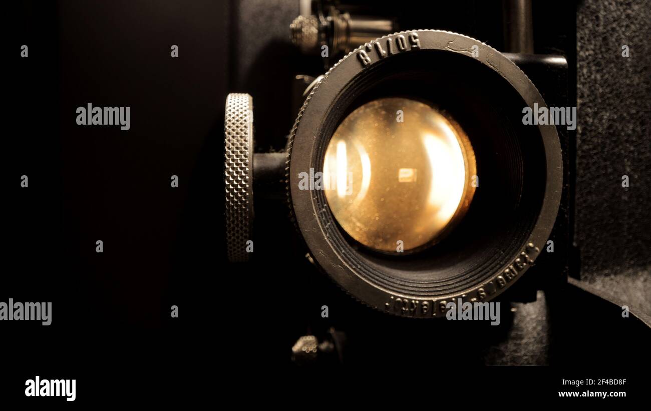 Lens of an old movie projector in close up view Stock Photo - Alamy