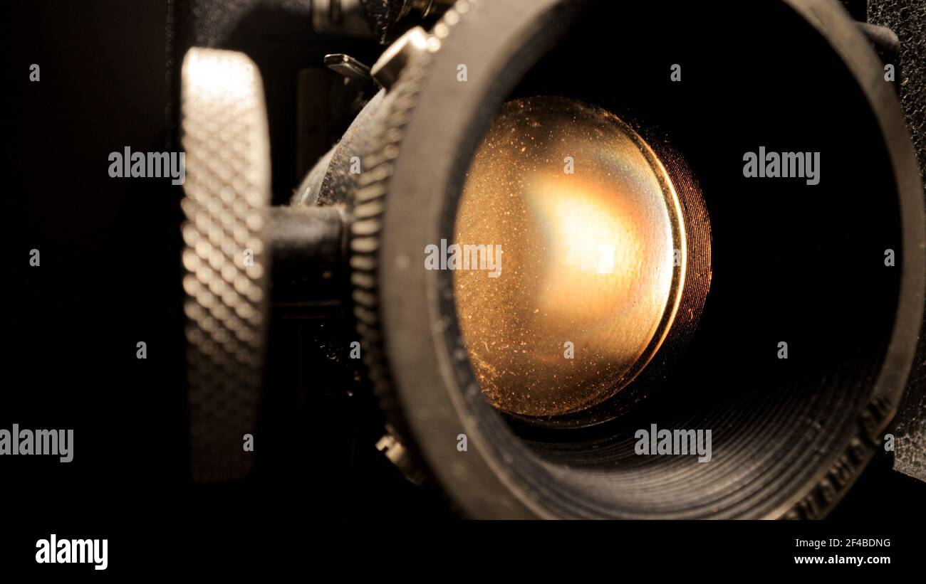 Lens of an old movie projector in close up view Stock Photo - Alamy