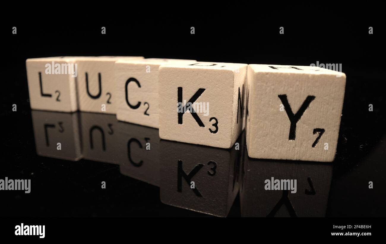 Letters on cubes write the word Lucky Stock Photo - Alamy