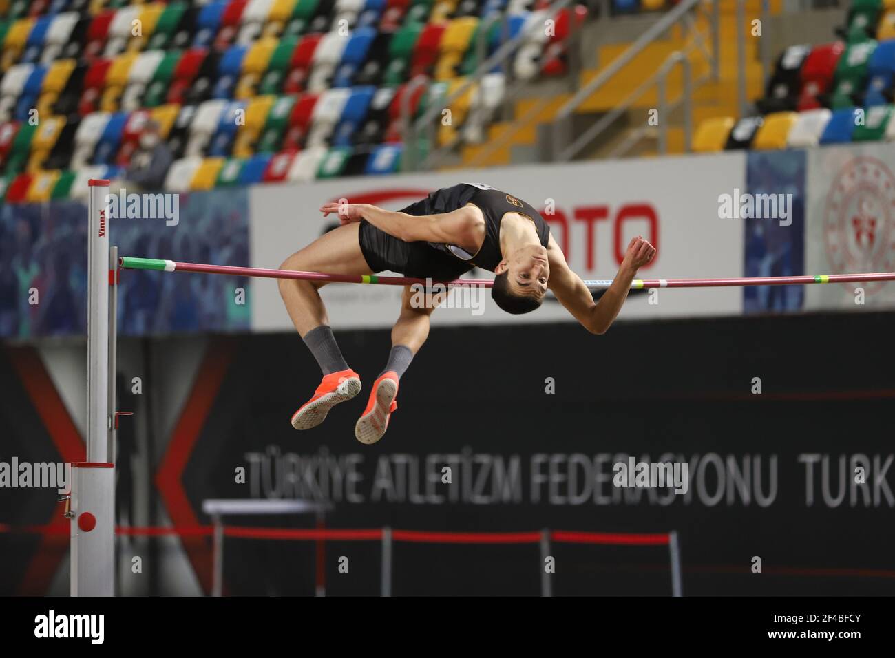 ISTANBUL, TURKEY - JANUARY 30, 2021: Undefined athlete high jumping ...