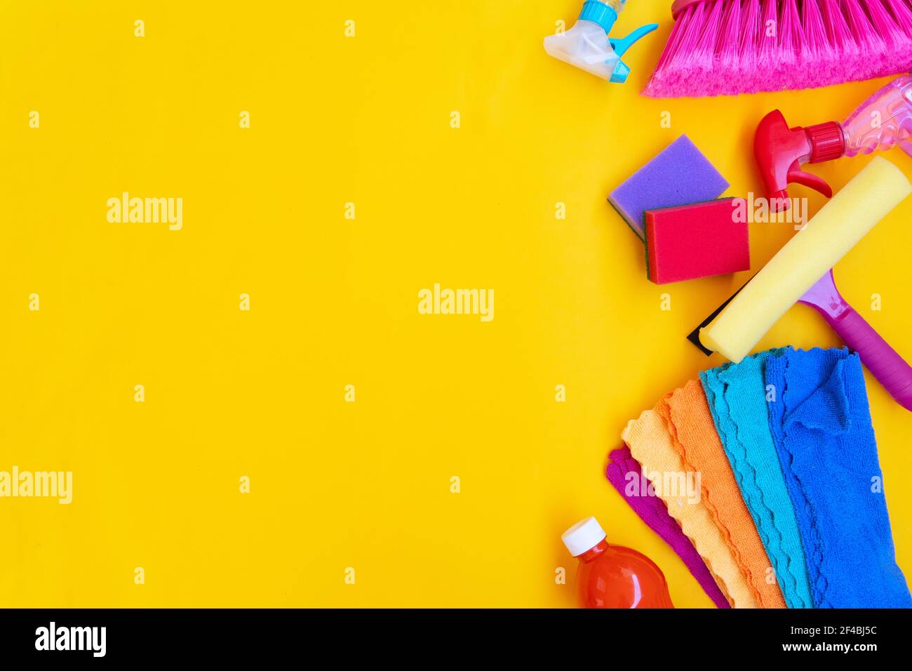 cleaning supplies tools on plain background Stock Photo - Alamy