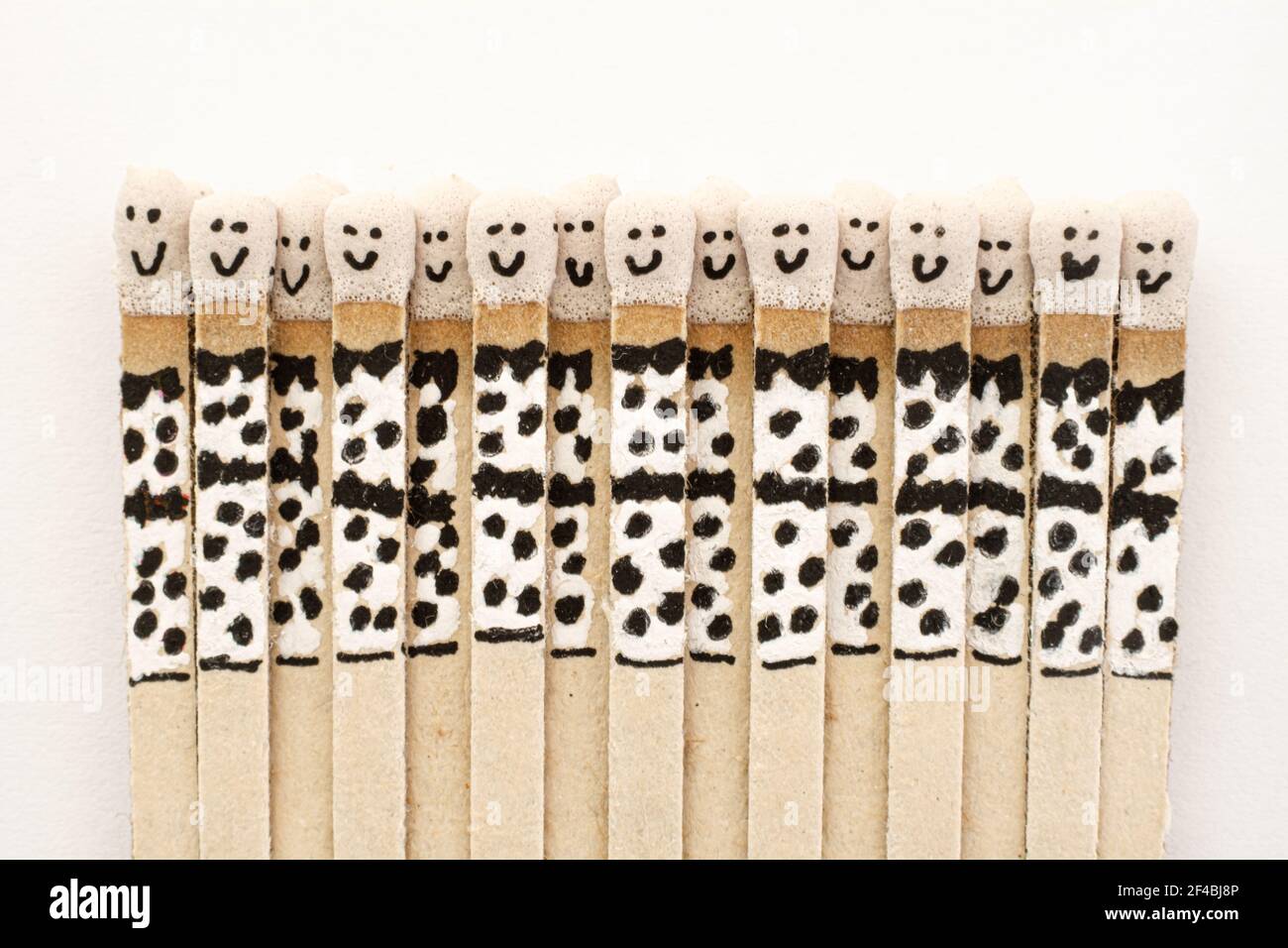 matchsticks on a white paper Stock Photo - Alamy