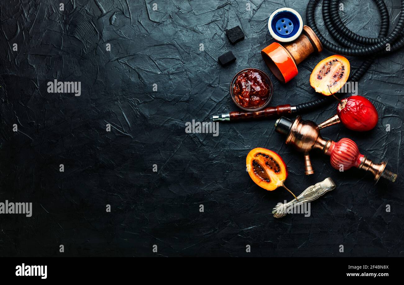 Shisha or shisha with tobacco with tamarillo aroma.Exotic hookah ...