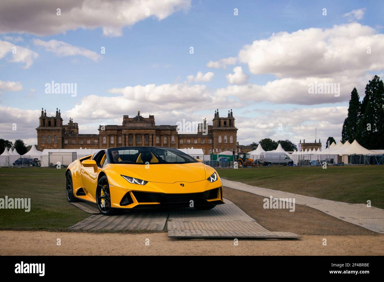 Yellow Lamborghini Huracan Evo Spyder supercar attending a car event ...
