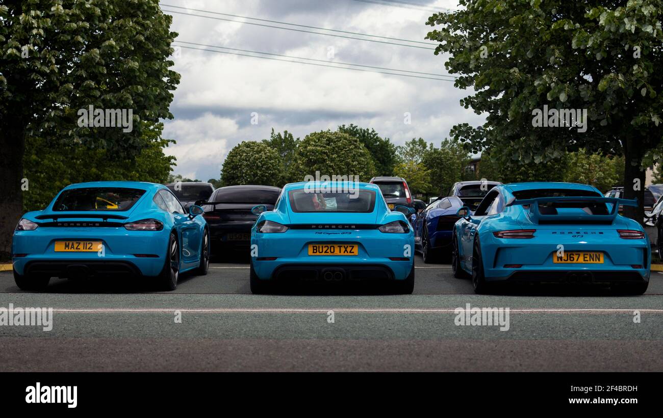 3 baby blue Porsche modern sports cars: 718 Cayman S, GTS and 911 GT3 ...