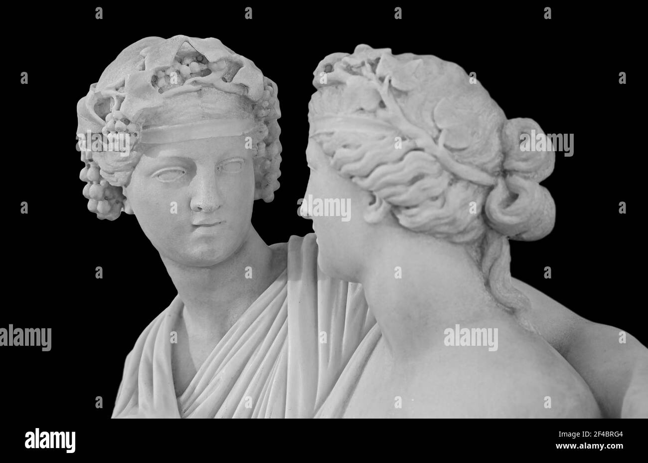 Ancient sculpture of Bacchus and Ariadne. Marble man and woman statue ...