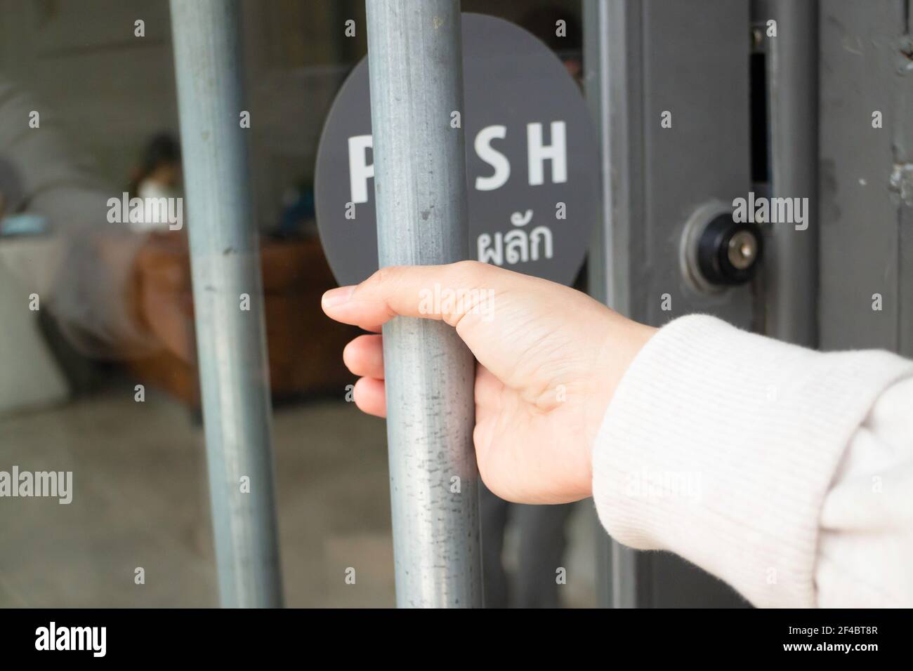 Hand on handle door for open to entering restaurant, stock photo Stock ...