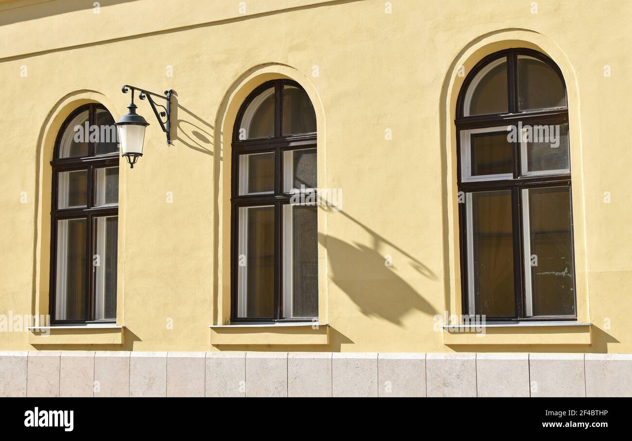 Windows of the old city hall building Stock Photo - Alamy