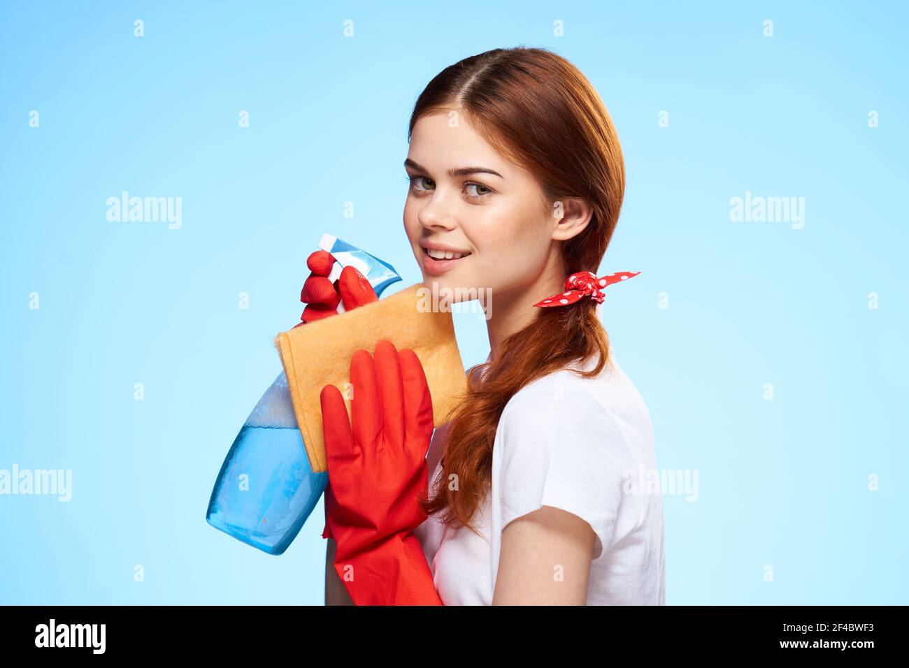cleaning lady holding detergent in her hands housekeeping work service ...