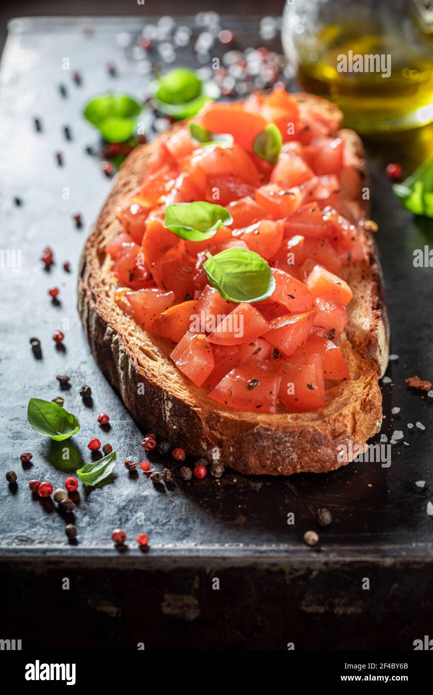 Delicious bruschetta with tomato and basil as starter. Italian cuisine ...