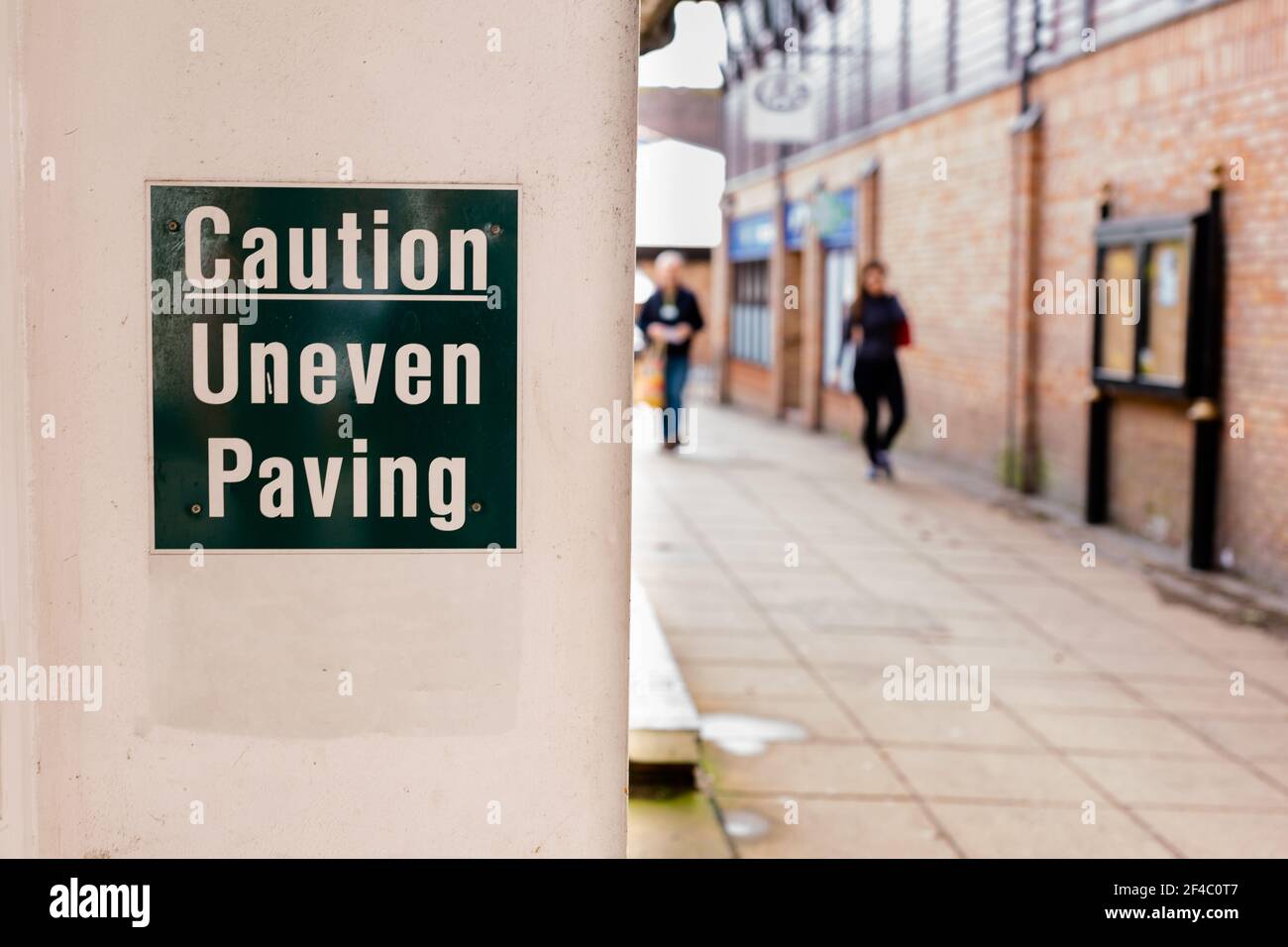 Caution uneven pavement hi-res stock photography and images - Alamy