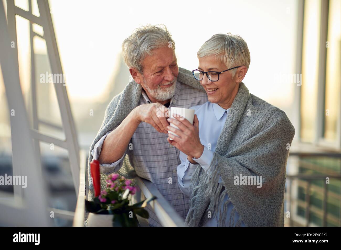 Old couple talking standing in hi-res stock photography and images - Alamy