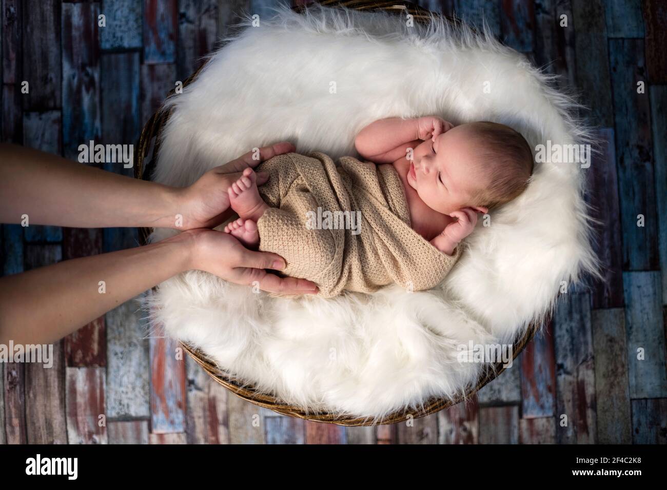 Little newborn baby enjoys the attention of her mother Stock Photo - Alamy