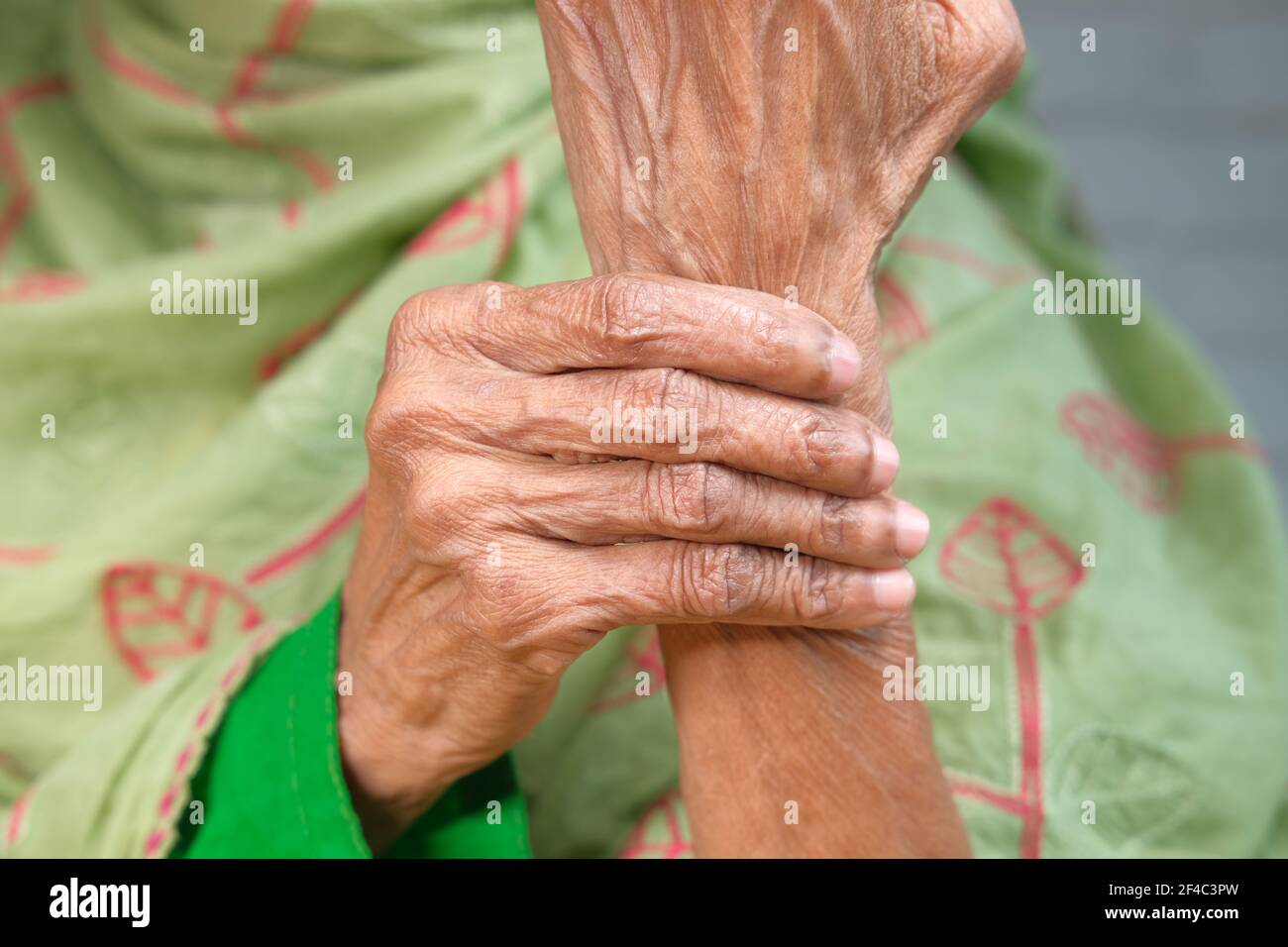 Elderly asian woman suffering from pain Stock Photo - Alamy