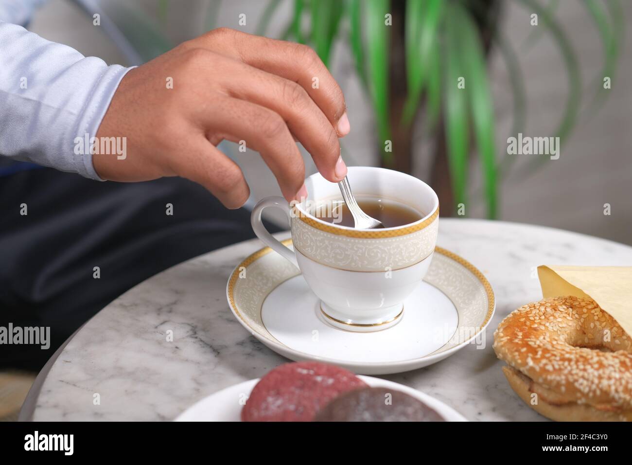 Stirring espresso coffee hi-res stock photography and images - Alamy