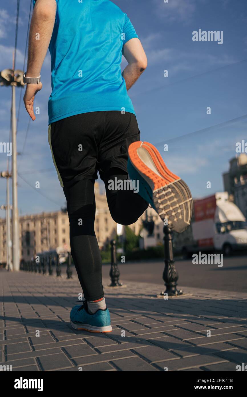 Man running in the city. Fitness workout, sport lifestyle concept Stock ...