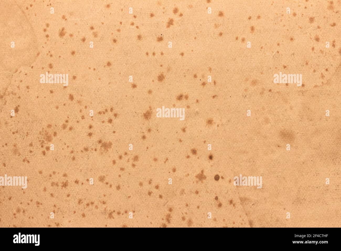 Old dirty yellow paper covered with stains Stock Photo - Alamy