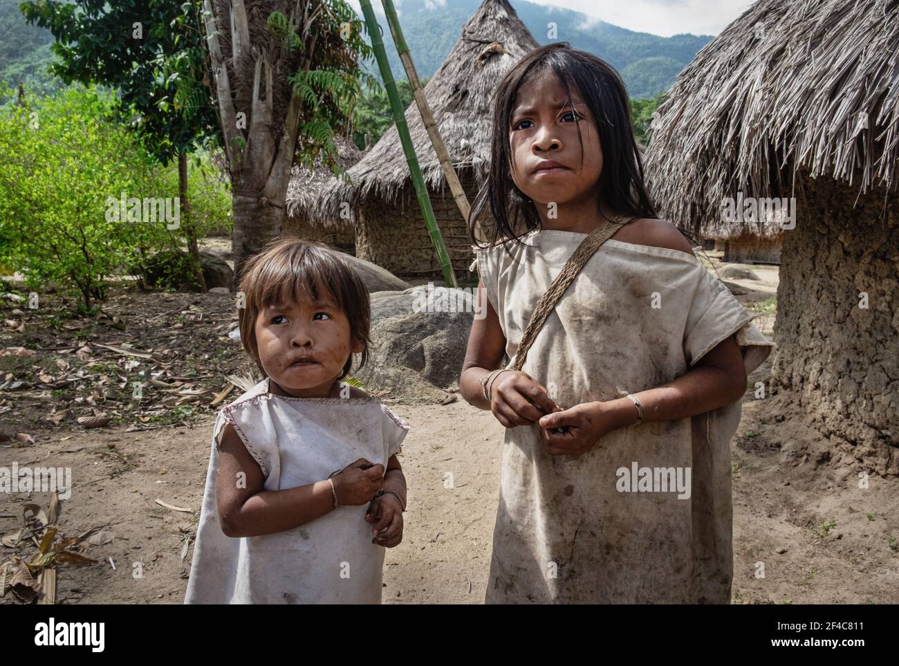 Two Kogi boys stand outside their hut in La Guajira, Colombia Stock ...