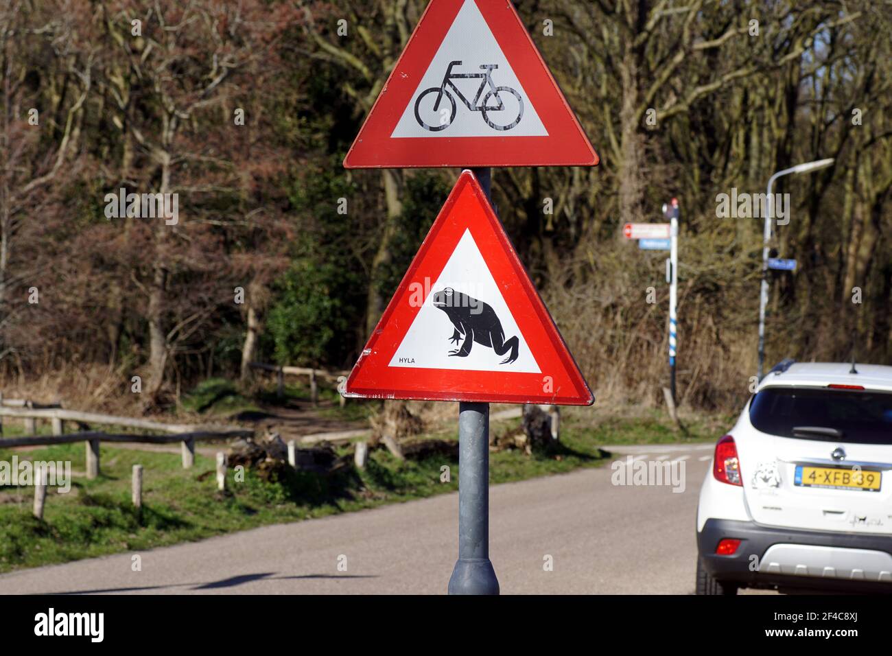 Netherlands, Bergen, March 19, 2021. Warning signs for cyclists and ...