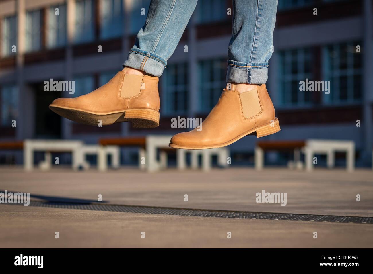 Woman in heels jumping hi-res stock photography and images - Alamy
