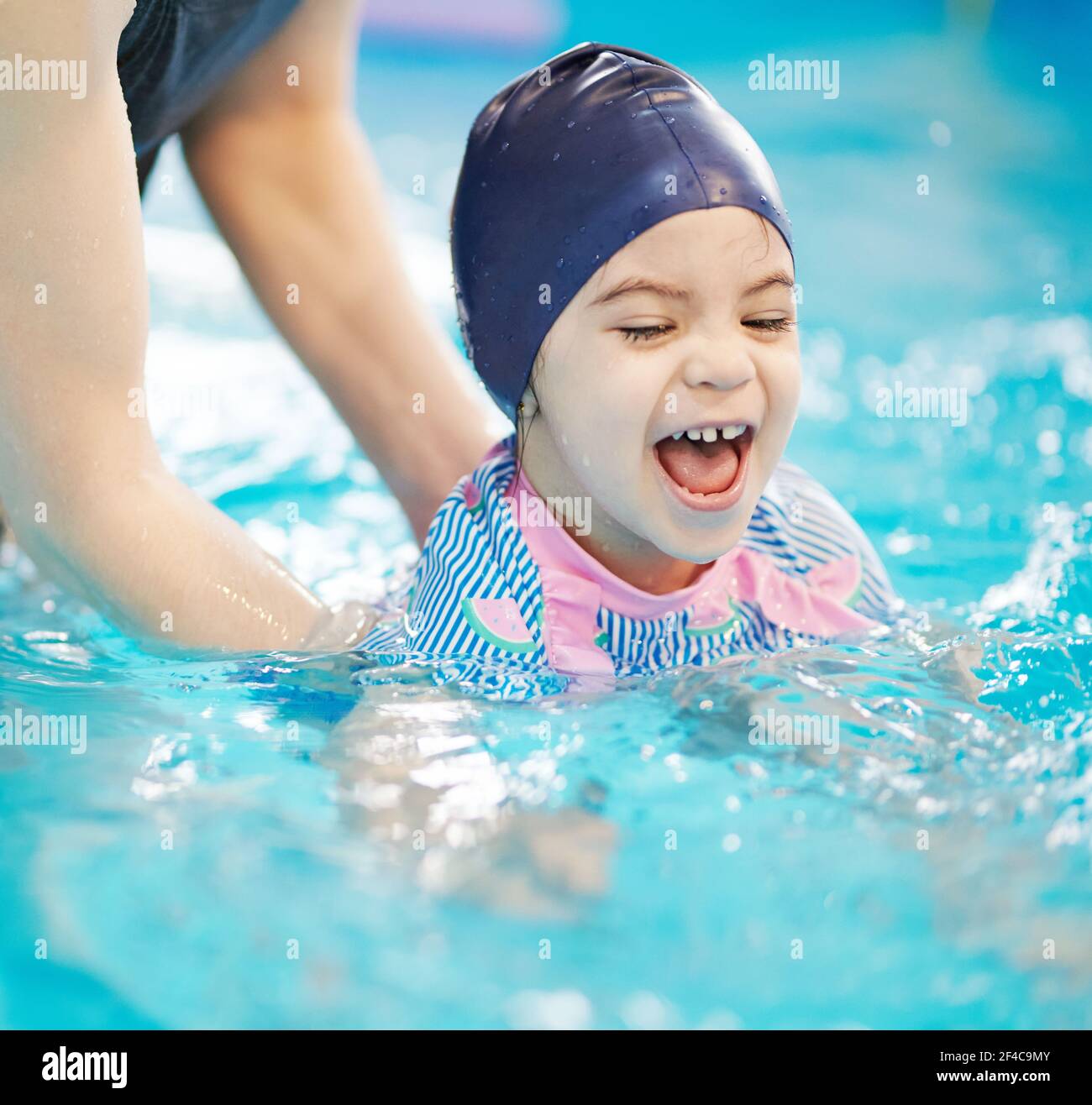 School child playing in water hi-res stock photography and images - Alamy