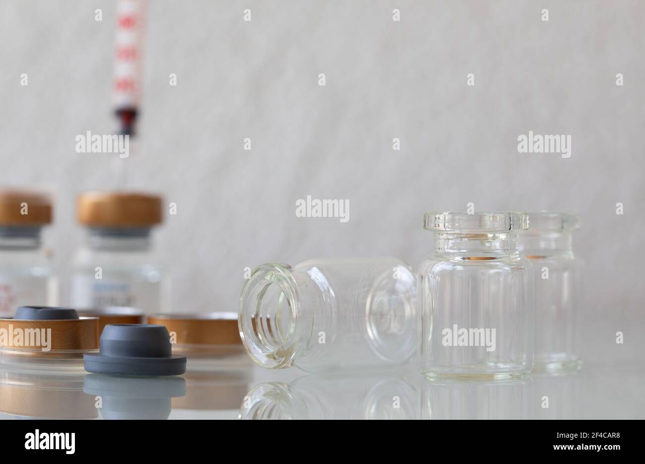 Glass vials for vaccines and medication. Closeup Stock Photo - Alamy